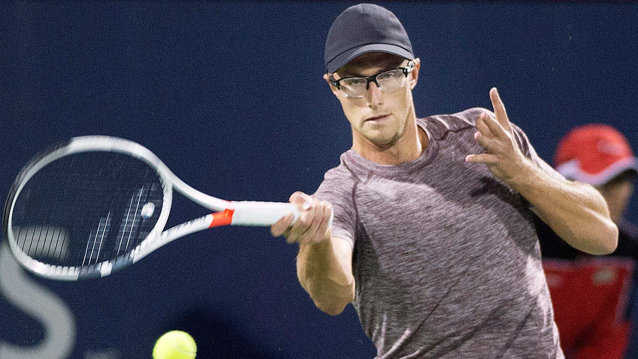 Polansky serves up gutsy performance to upset fellow Canuck Pospisi...